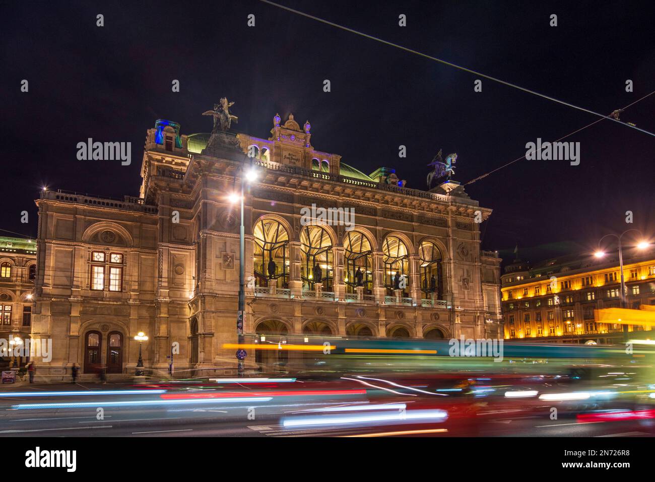 Vienna, opera Staatsoper, light trails of cars, night in 01. Old Town ...