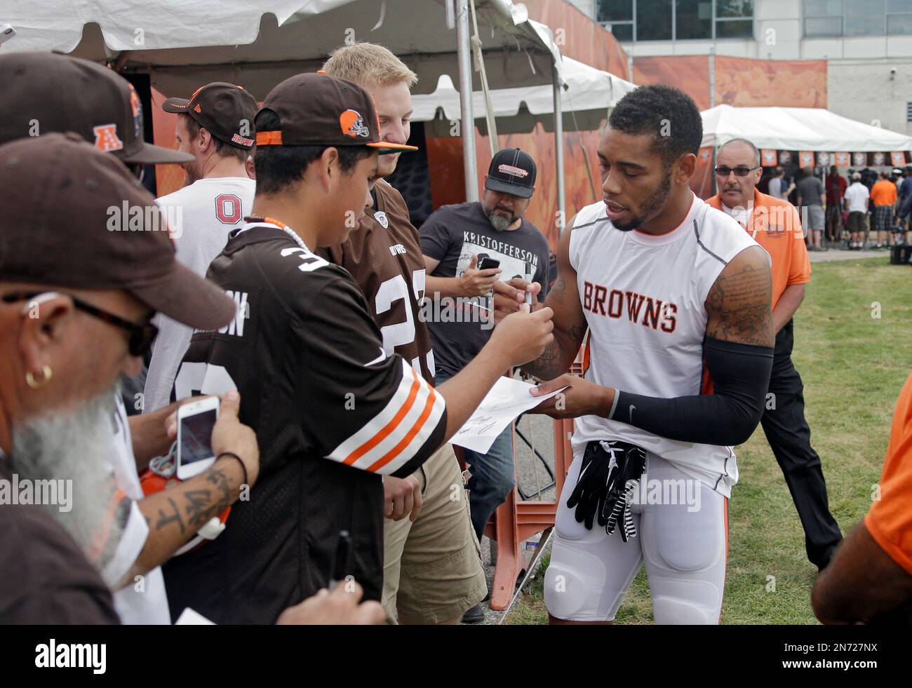 Cleveland Browns defensive back Joe Haden signs autographs for fans ...