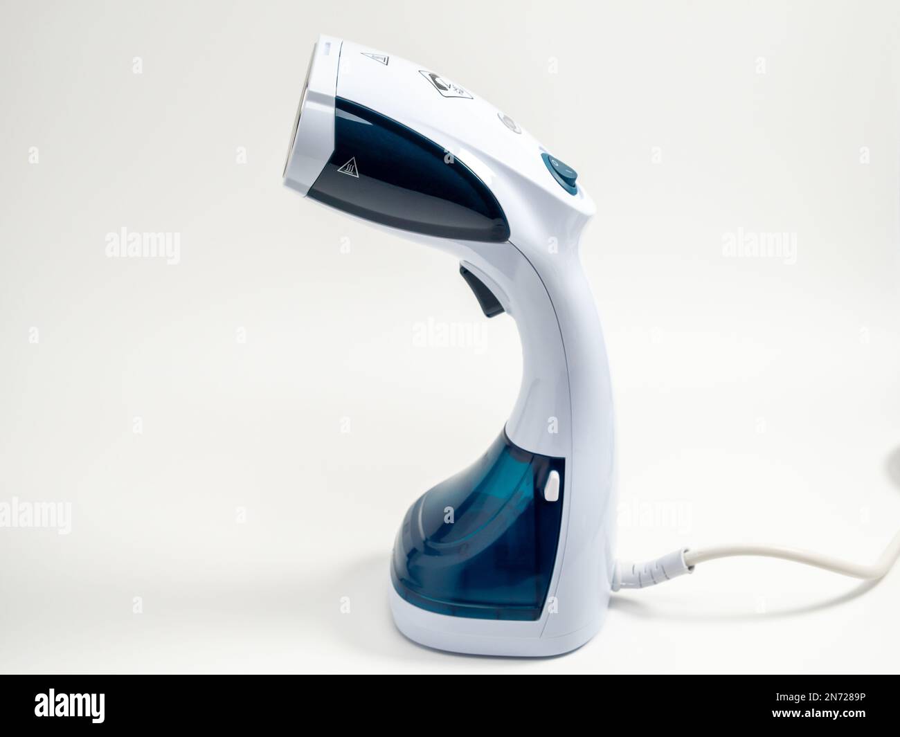 Steamer for clothes on a white background. Portable iron. Iron for ...