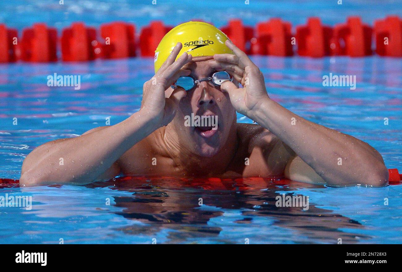 Australia's Ashley Delaney adjusts his goggles after finishing a Men's ...