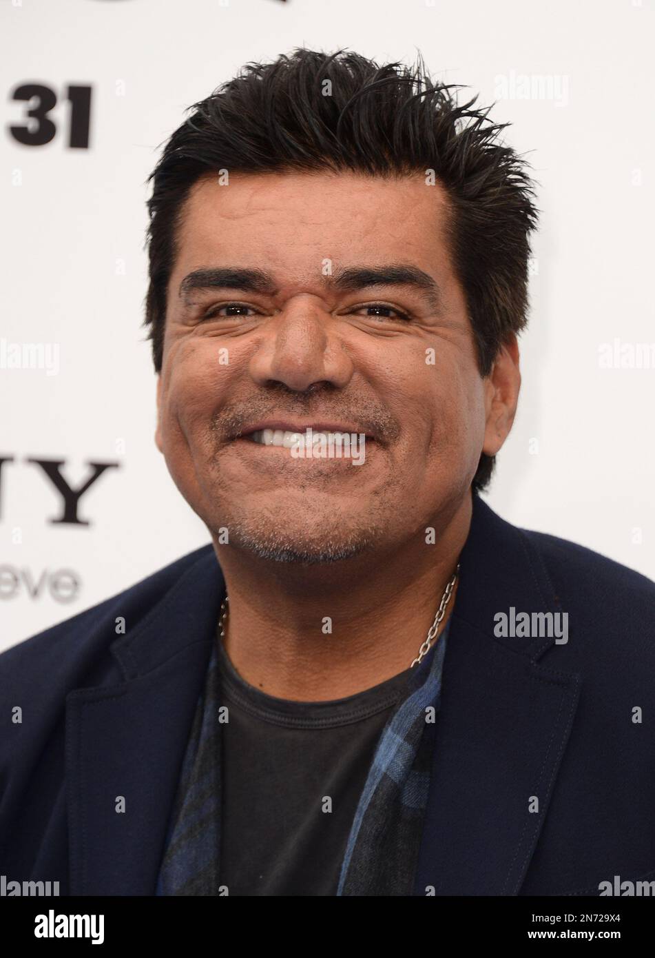 George Lopez arrives at the world premiere of "The Smurfs 2" at the ...