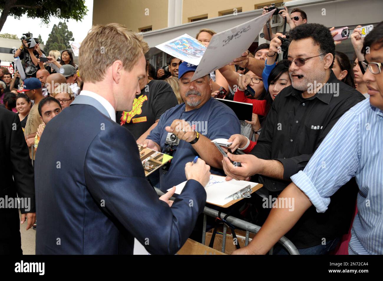 Actor Neil Patrick Harris signs autographs at the world premiere of ...