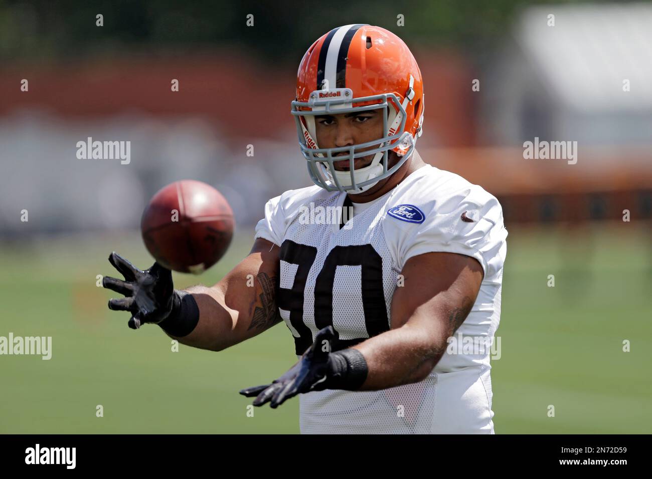 Cleveland Browns defensive lineman Billy Winn practices during training ...