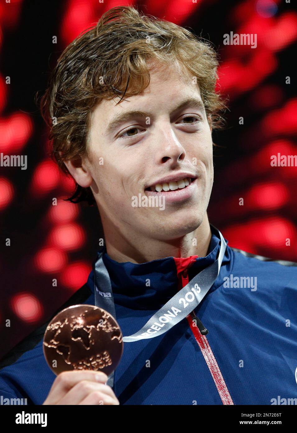 Connor Jaeger of the United States holds his bronze medal after ...