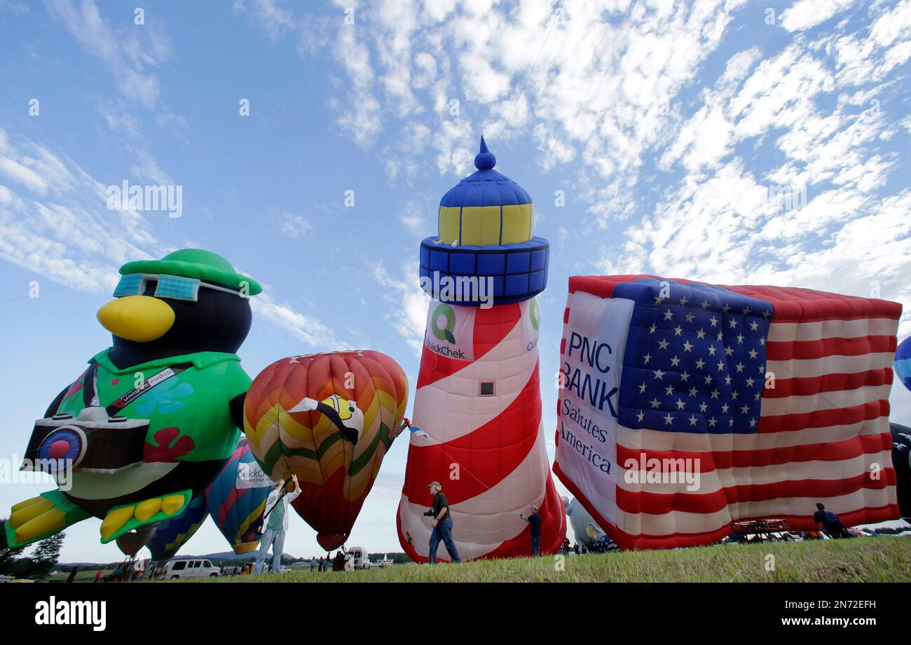 Hot air balloons, including a 115-foot-tall flying lighthouse, are ...