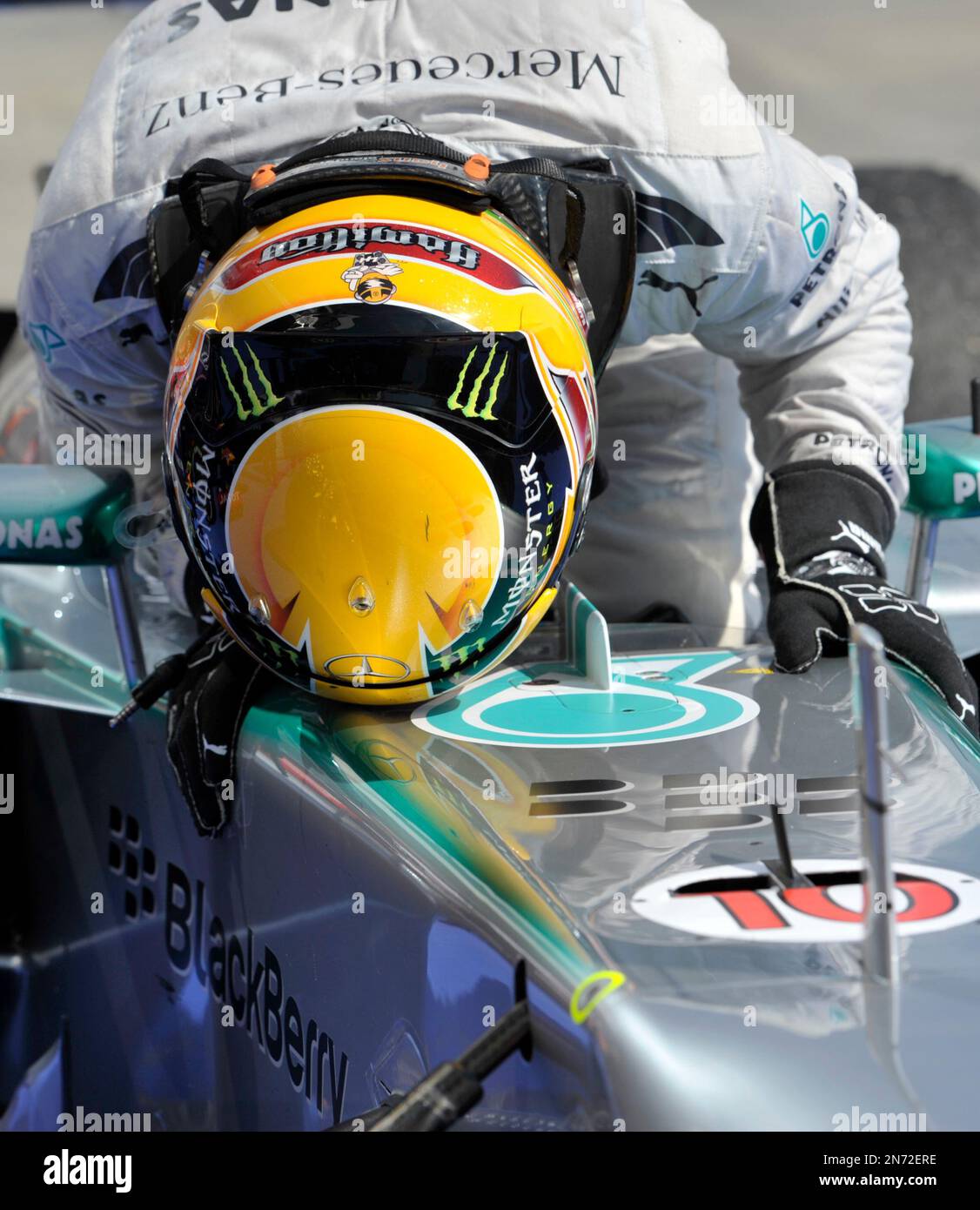 Mercedes driver Lewis Hamilton of Britain kisses his car after winning ...
