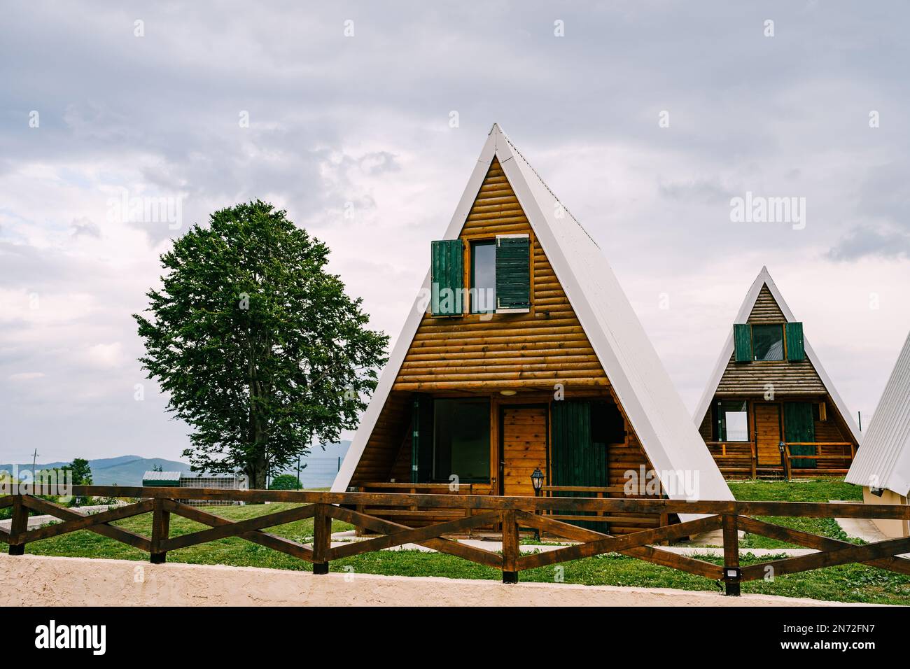 Triangular wooden two-story houses in Durmitor National Park Stock ...