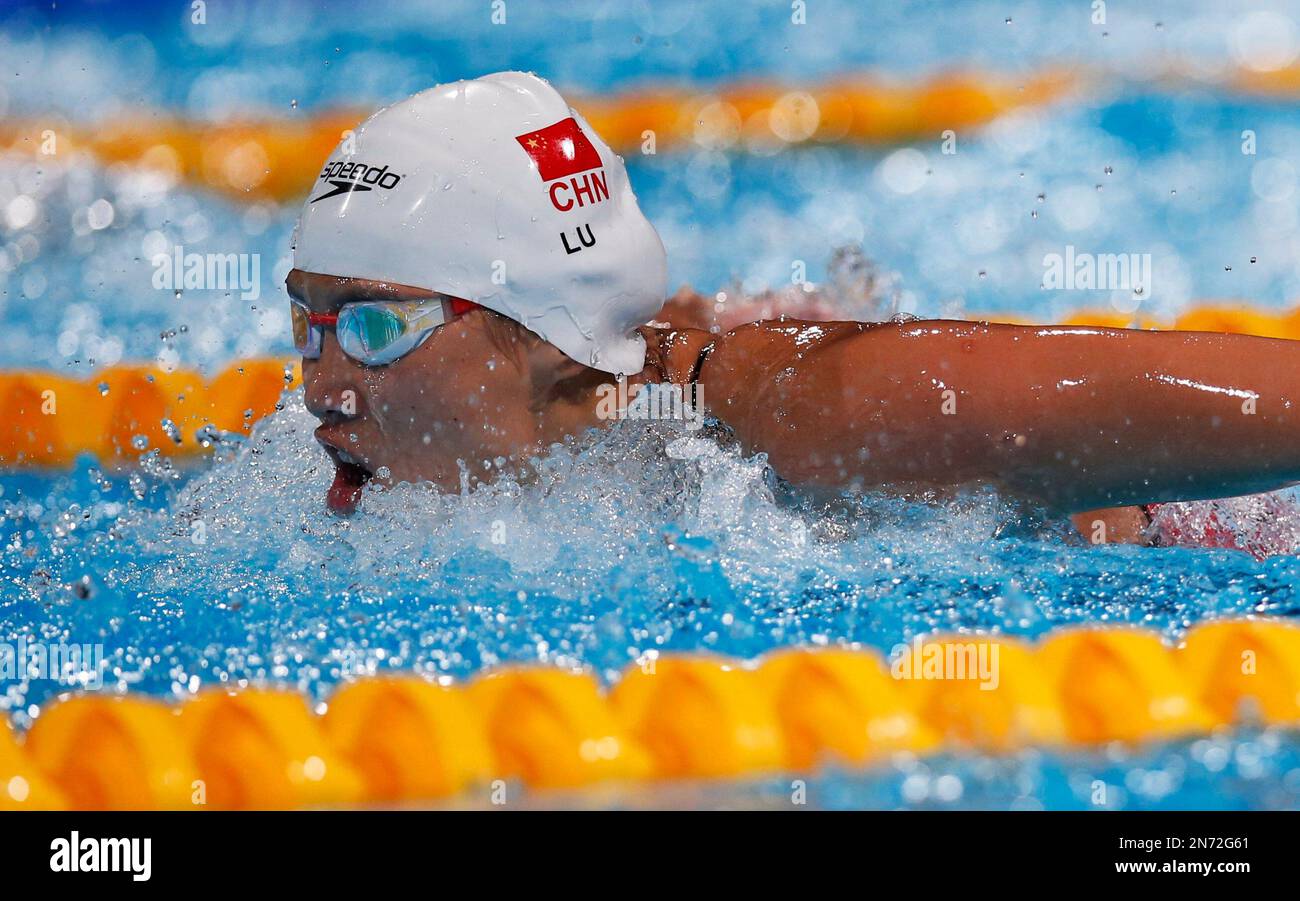 China's Lu Ying competes in a heat of the Women's 100m butterfly at the ...