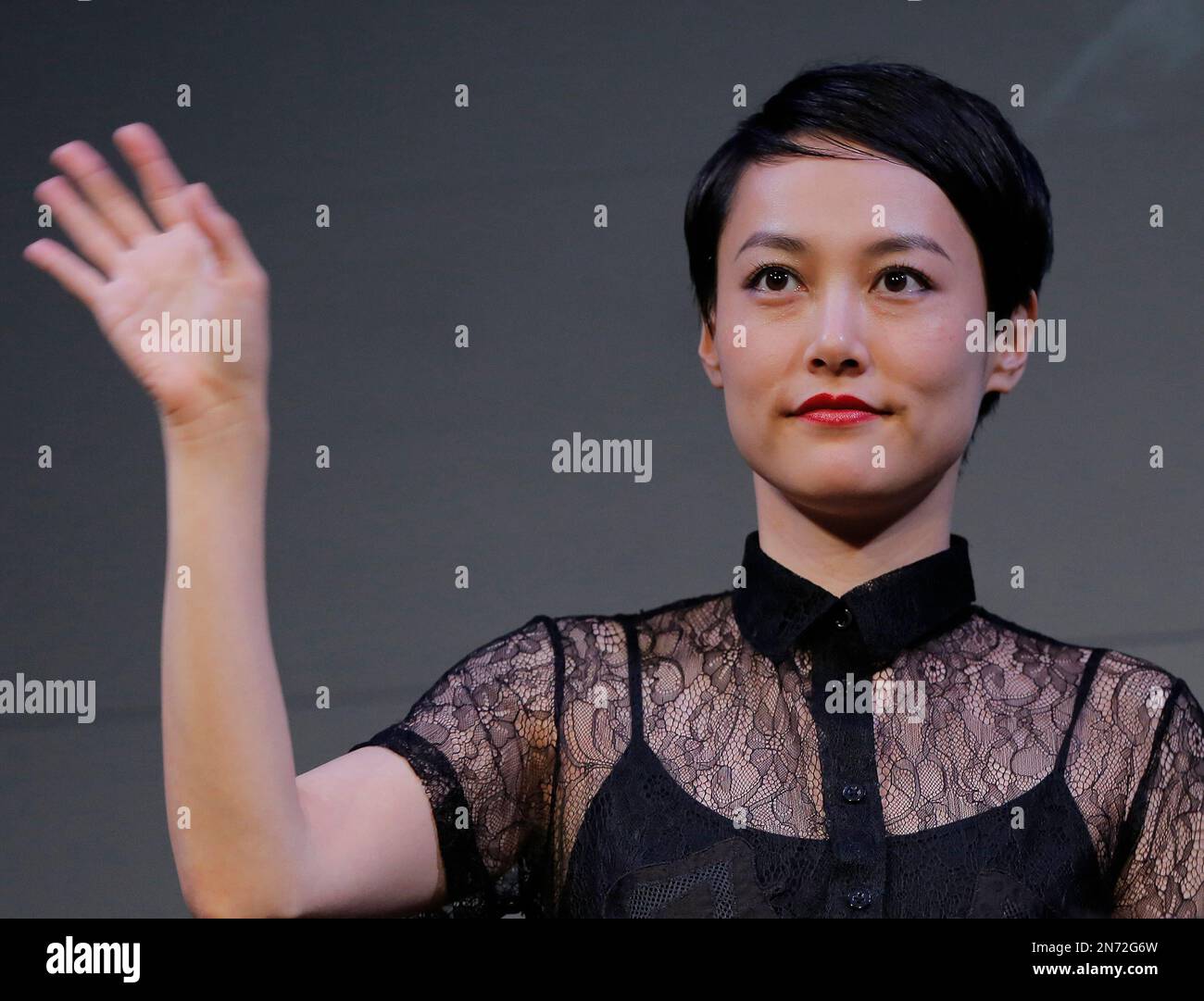 Japanese actress Rinko Kikuchi poses for photographers during a press ...