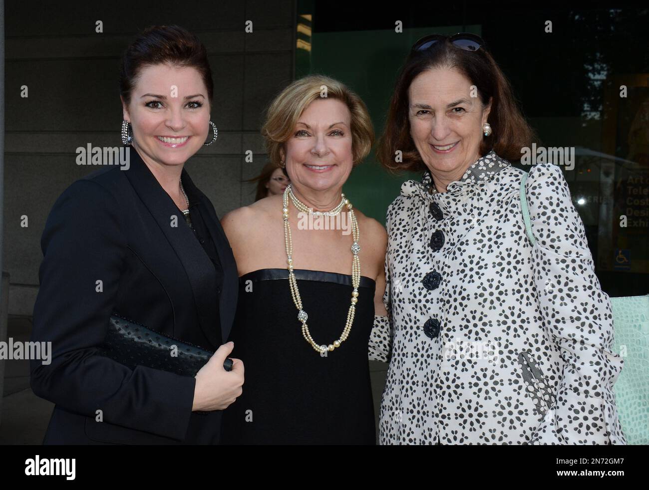 From left, Sheri Weller, Director of the FIDM Museum Barbara Bundy and ...