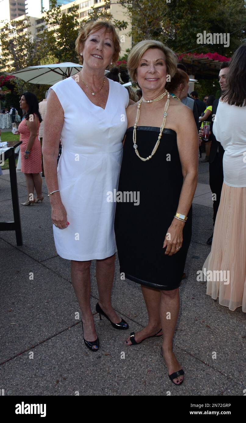 From left, FIDM's Lyn Tobman and Director of FIDM Museum Barbara Bundy ...