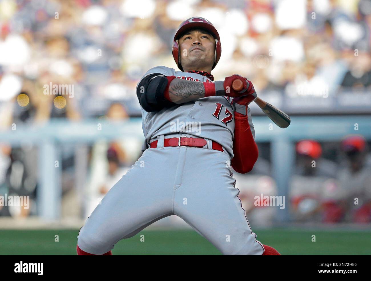 Cincinnati Reds' Shin-Soo Choo, of South Korea, backs away from a close ...
