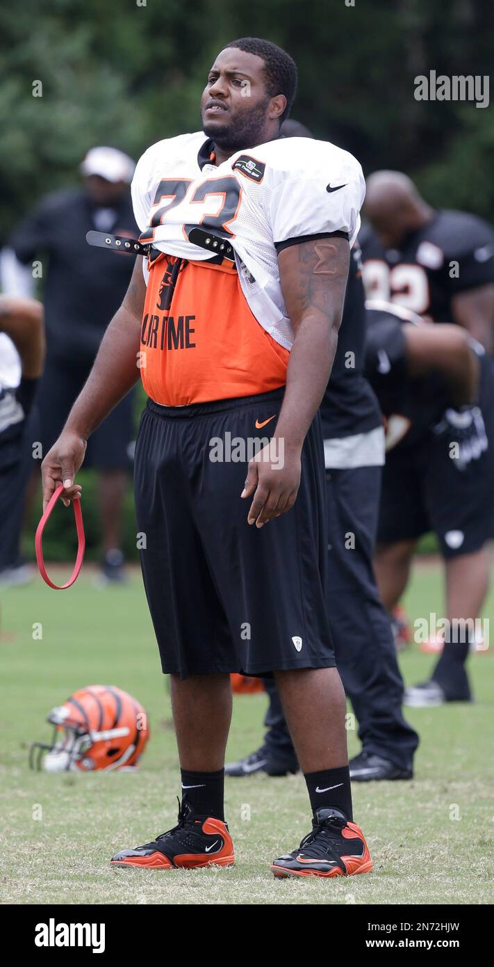 Cincinnati Bengals offensive tackle Anthony Collins loosens up during ...