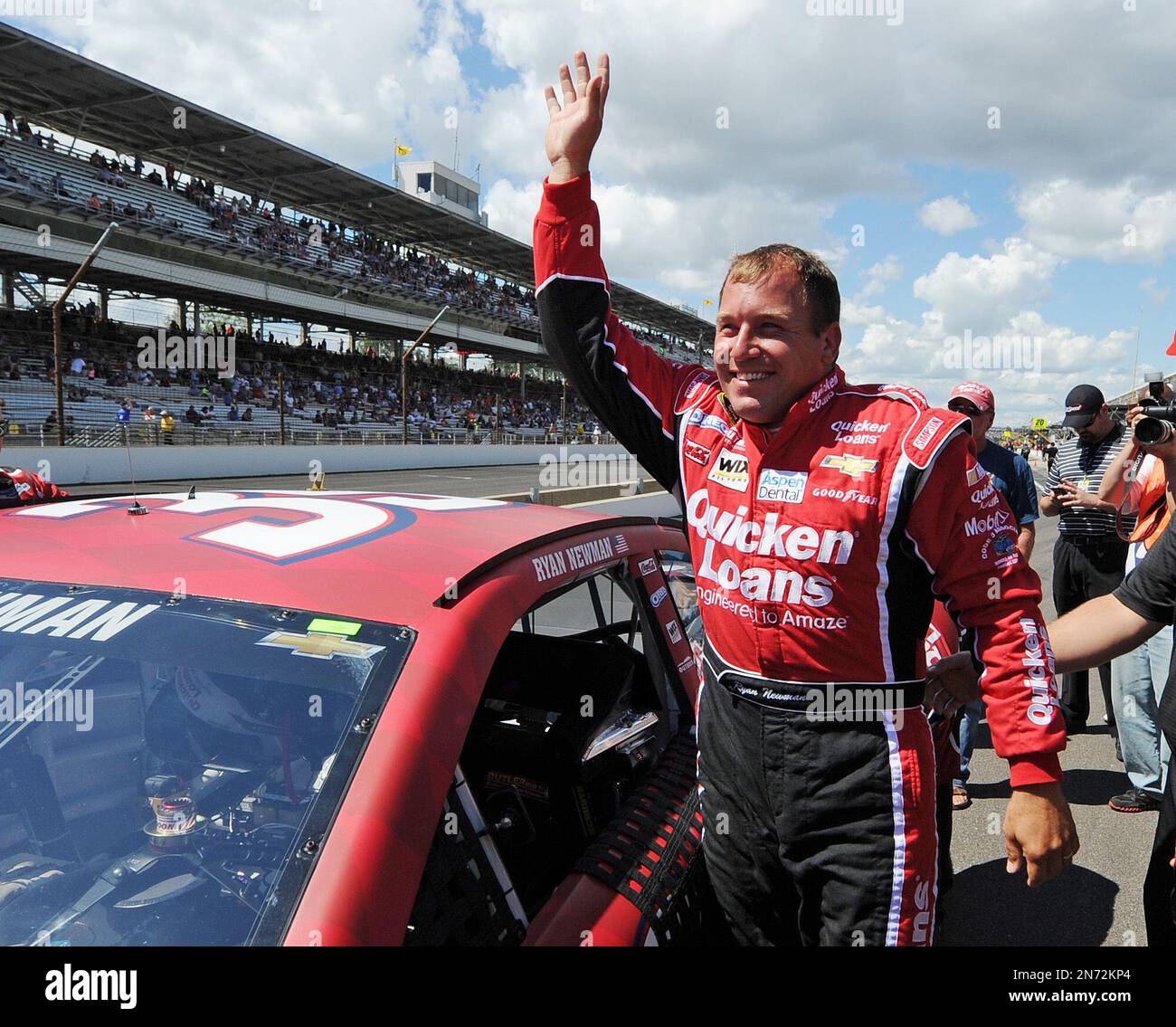 Sprint Cup Series driver Ryan Newman waves to the fans after qualifying ...