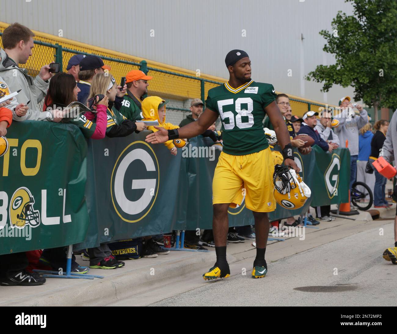 Green Bay Packers' Sam Barrington walks to NFL football training camp ...
