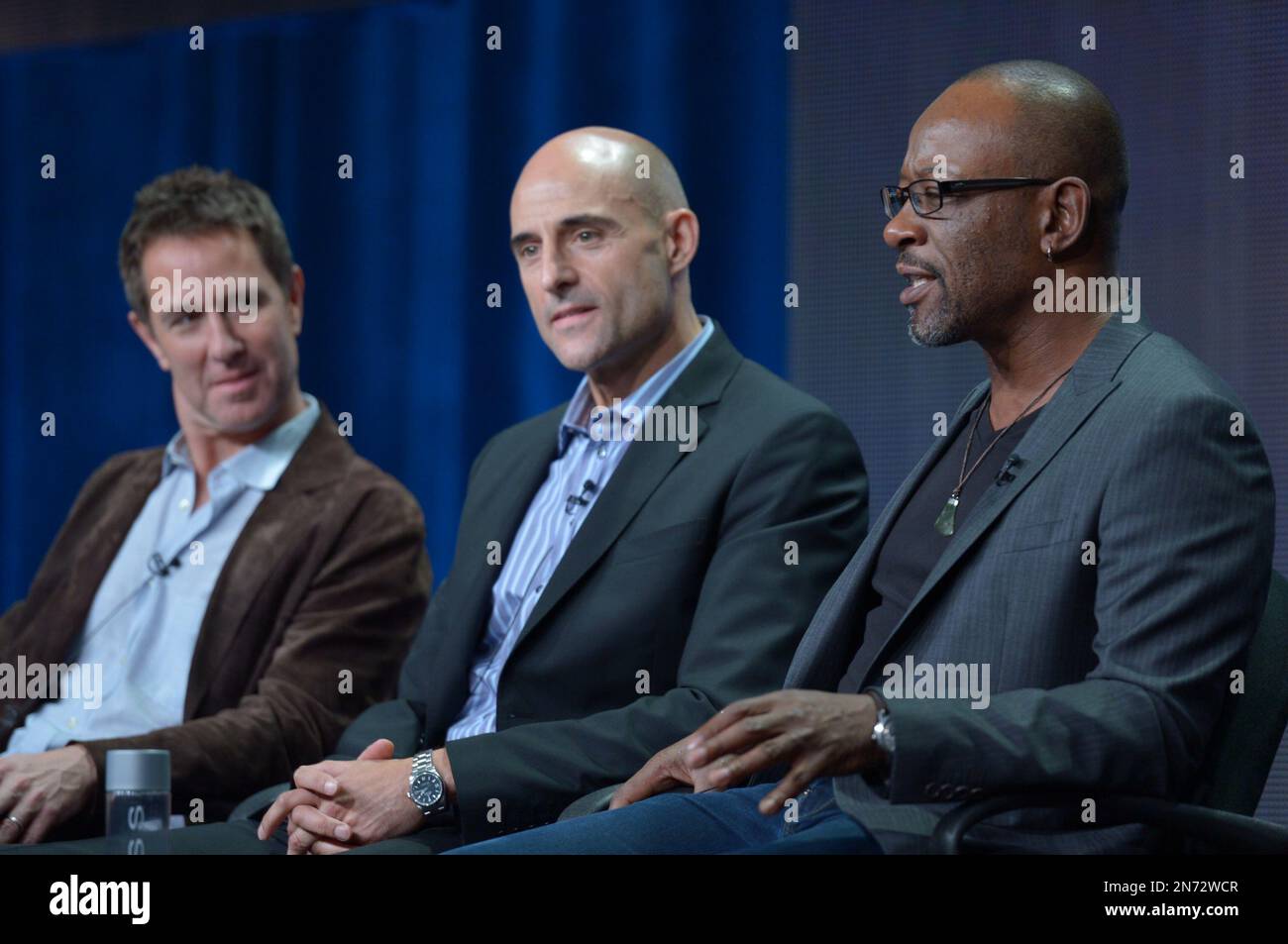 From left, Executive producer Chris Mundy, actor Mark Strong, and actor ...
