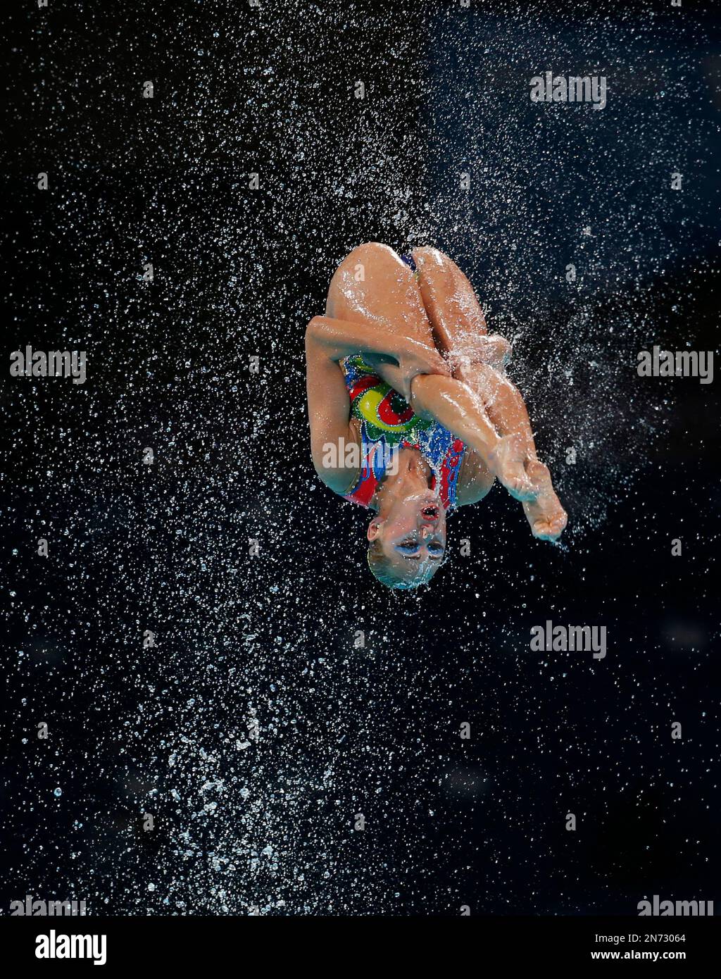 Ukraine perform their routine during the synchronized swimming team ...