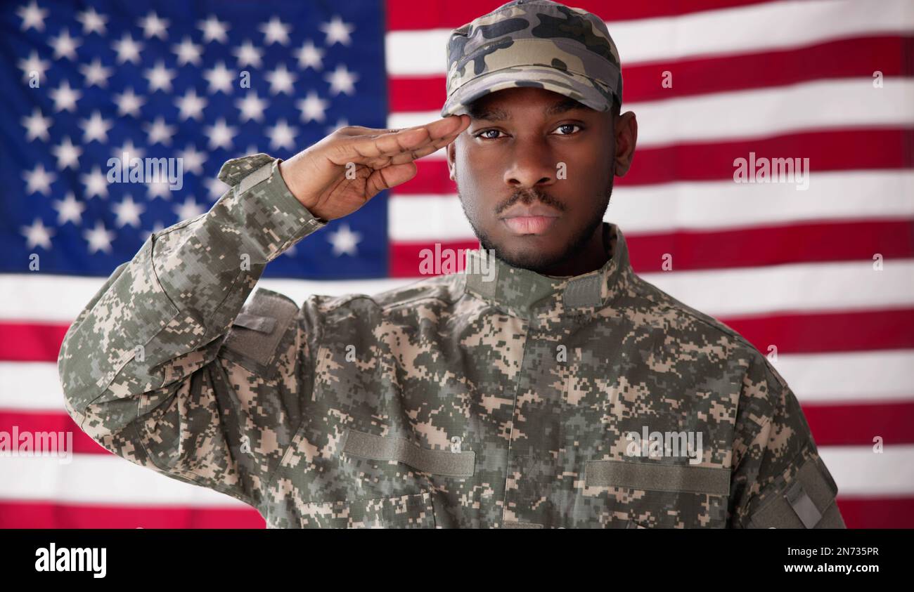 Rear View Of Military Man Saluting Us Flag Stock Photo - Alamy