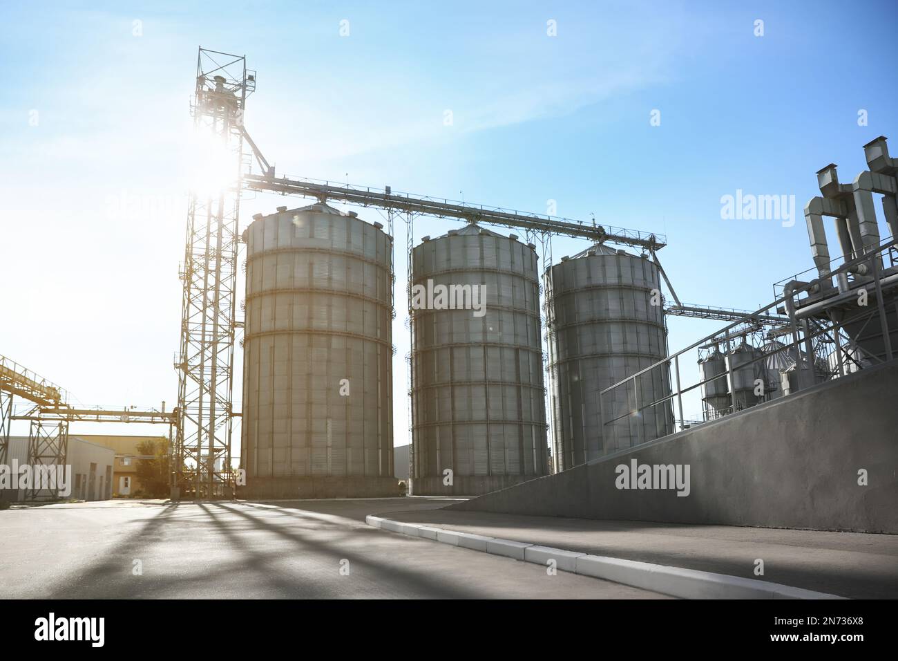 View of modern granaries for storing cereal grains outdoors Stock Photo ...