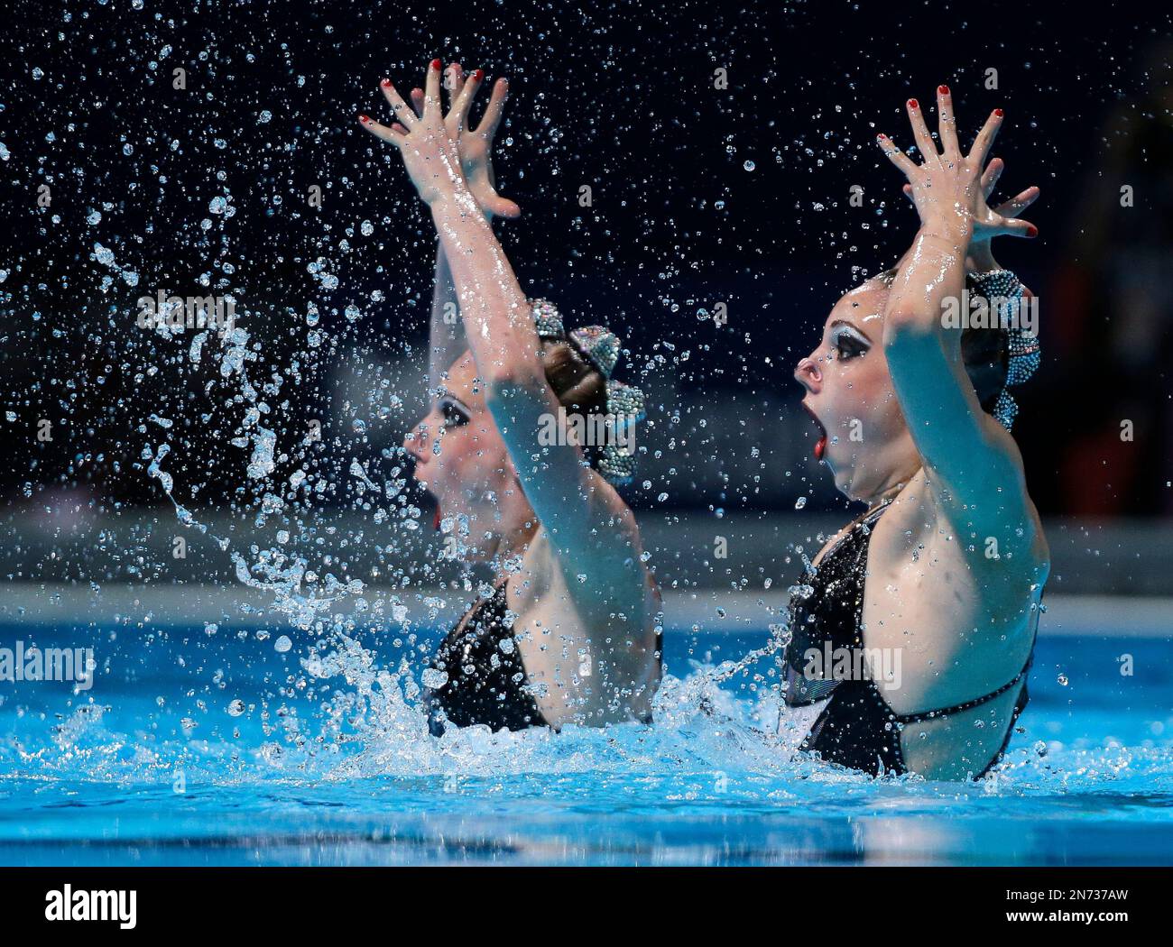 Russia's Svetlana Kolesnichenko and Svetlana Romashina perform their ...