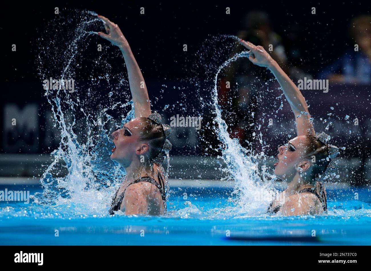Russia's Svetlana Kolesnichenko and Svetlana Romashina perform their ...
