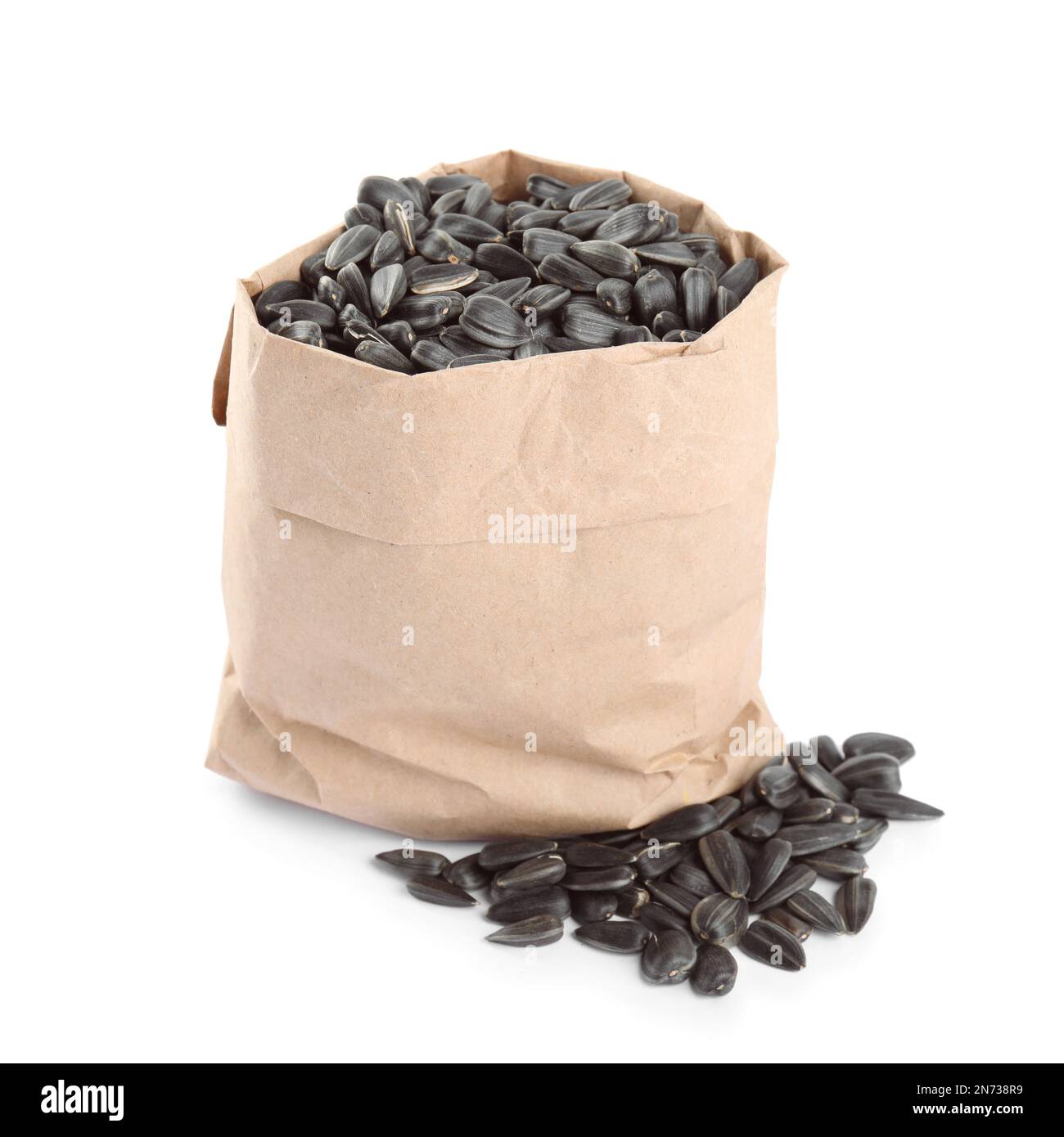 Sunflower seeds in bag on white background Stock Photo - Alamy