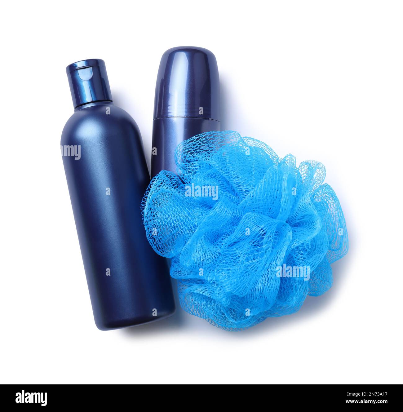 Shampoo, roller deodorant and bast wisp isolated on white, top view ...