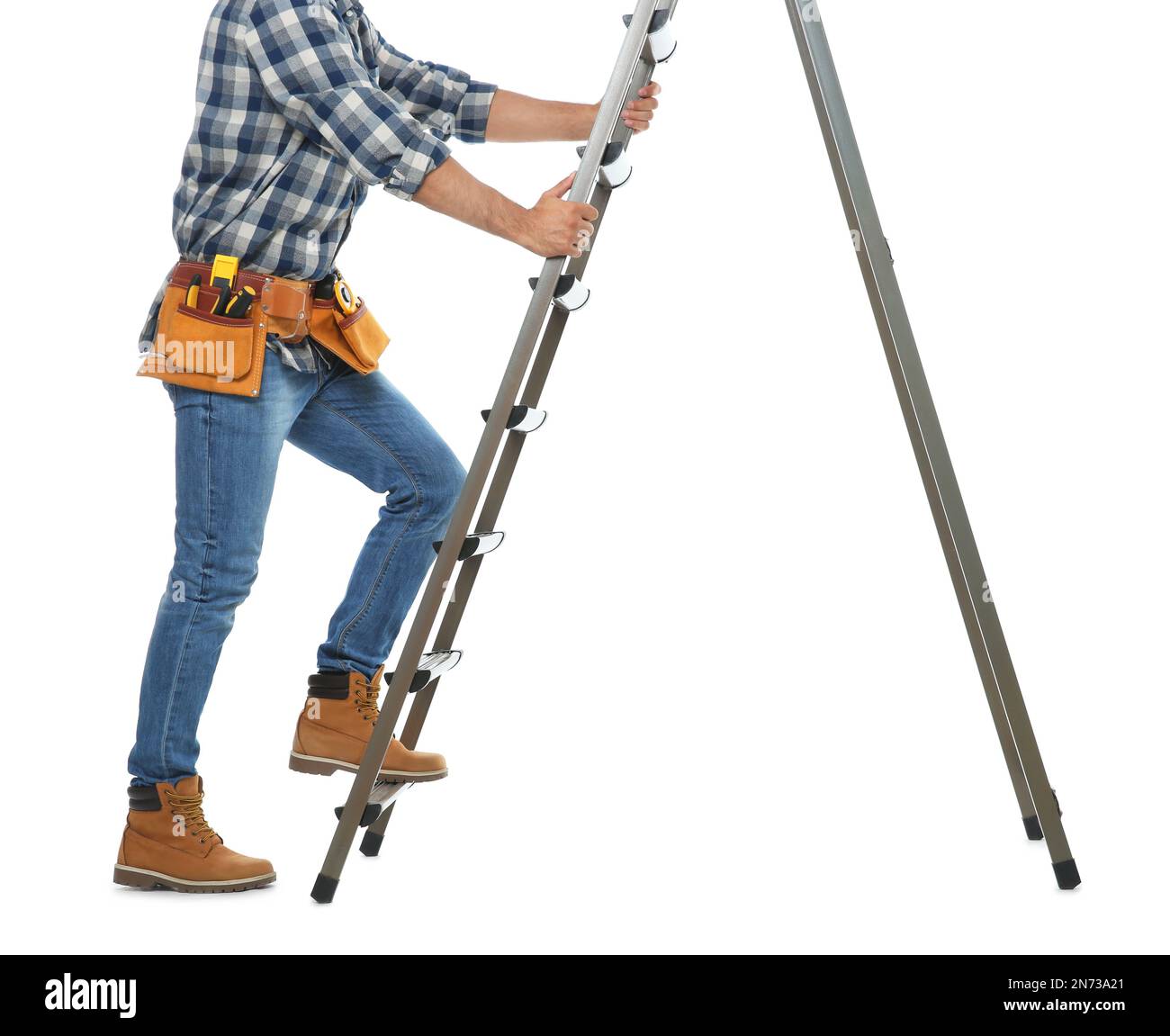 Professional builder climbing up metal ladder on white background ...