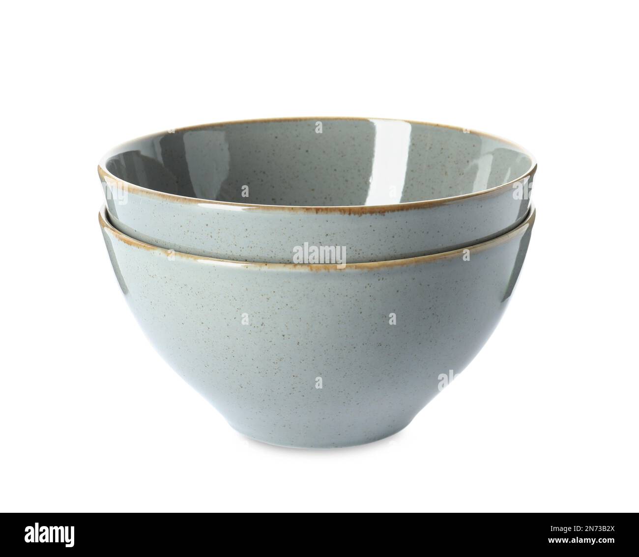 New grey ceramic bowls on white background Stock Photo - Alamy