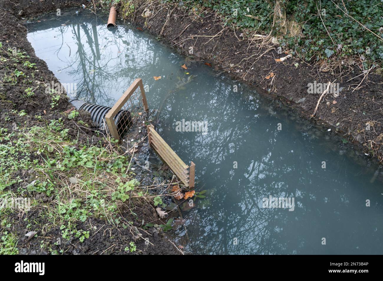 Industrial discharge has caused the river to change colour causing harm ...