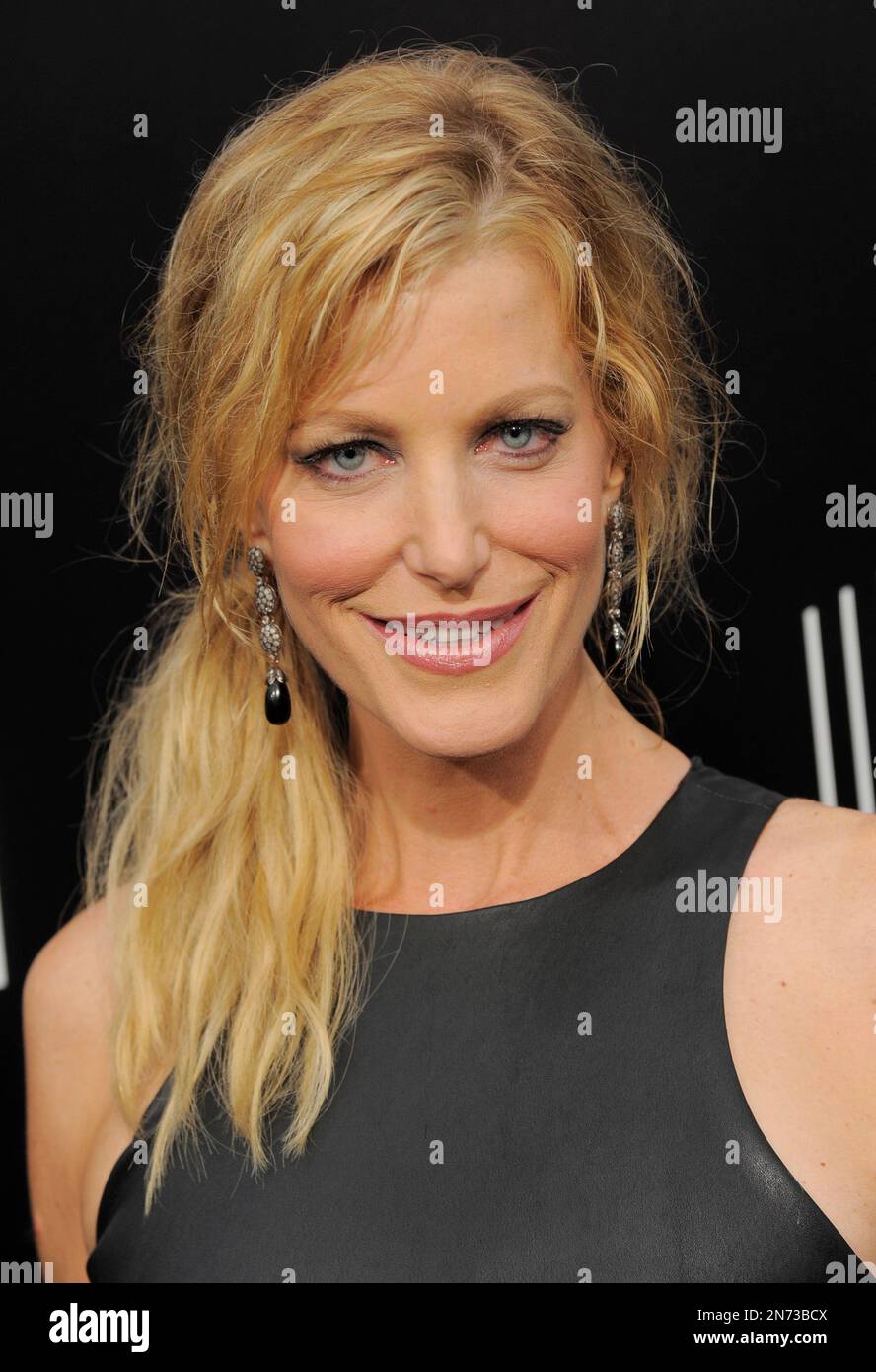 Anna Gunn, a cast member in "Breaking Bad," poses at the premiere ...