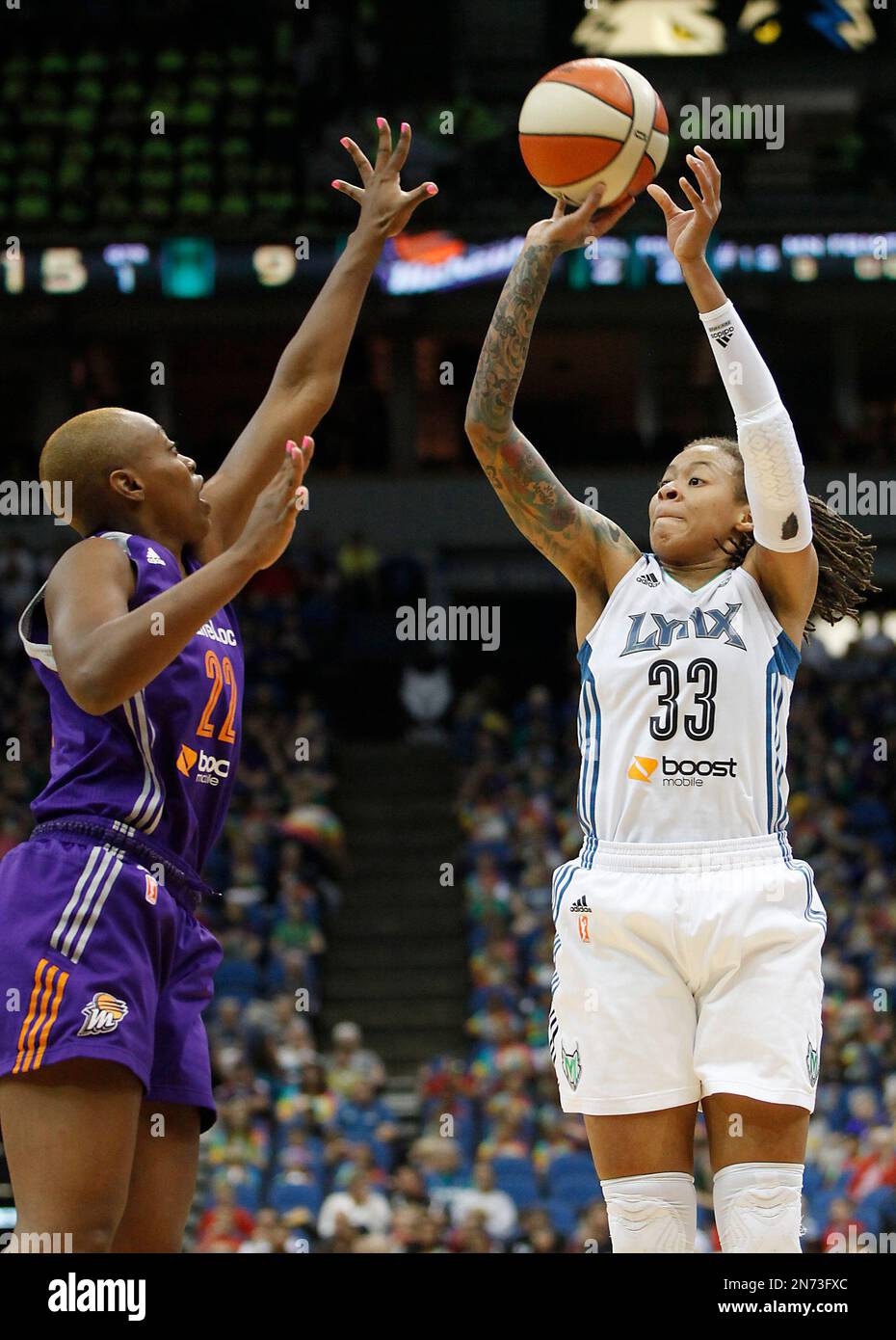 Minnesota Lynx guard Seimone Augustus (33) goes up for a shot against ...