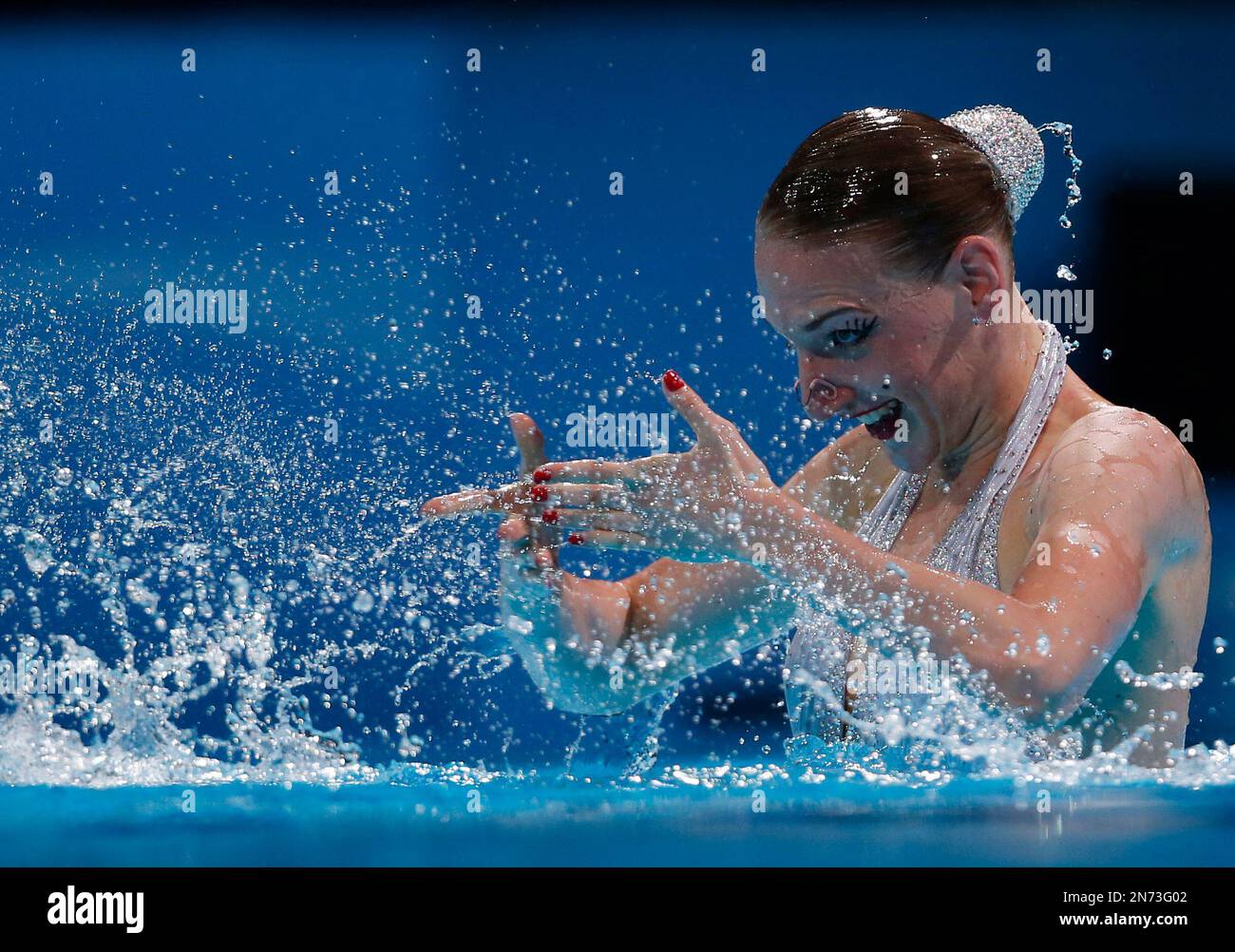 Russia's Svetlana Romashina performs her routine in the synchronized ...