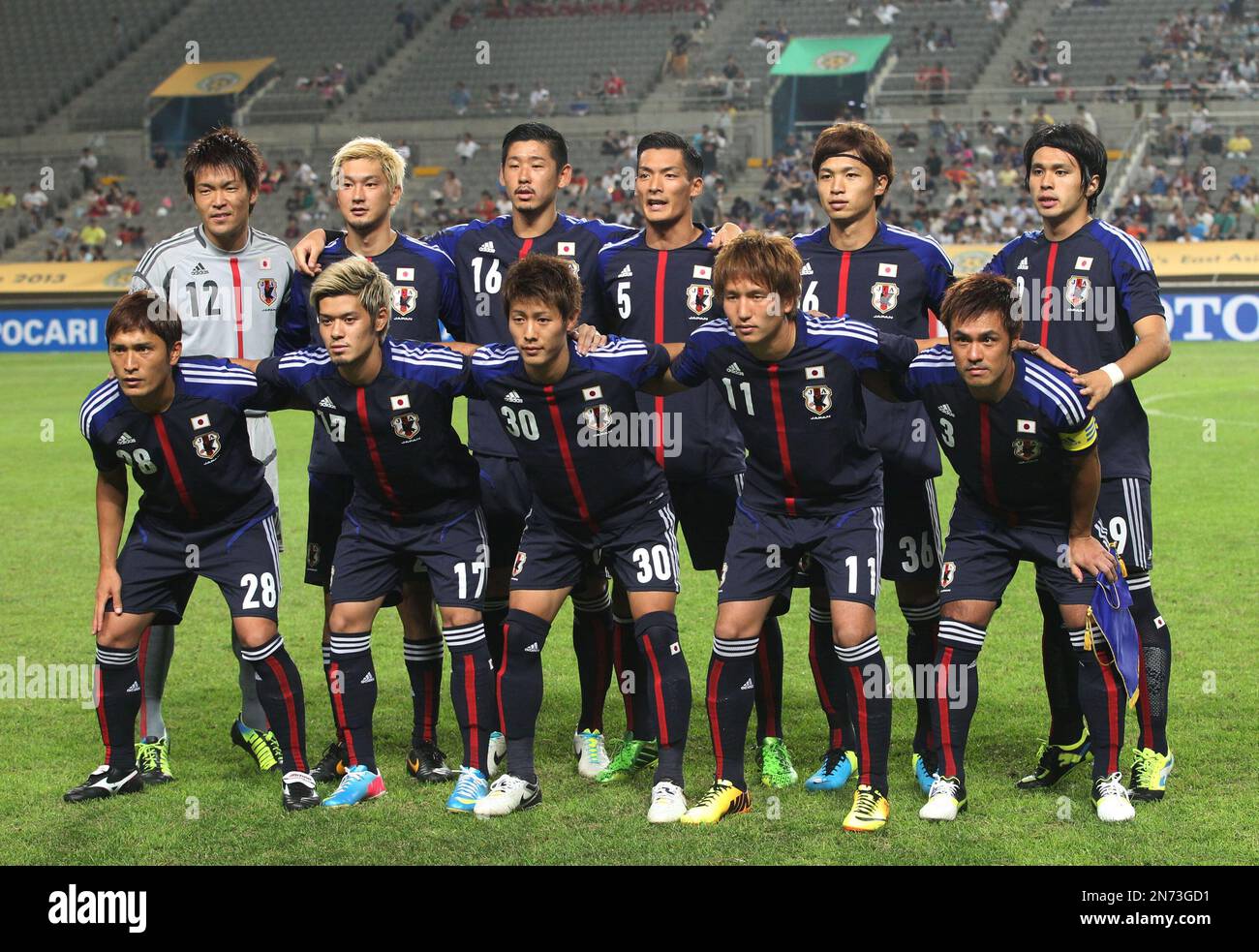 Japan's men national soccer team players, back row from left, Nishikawa ...