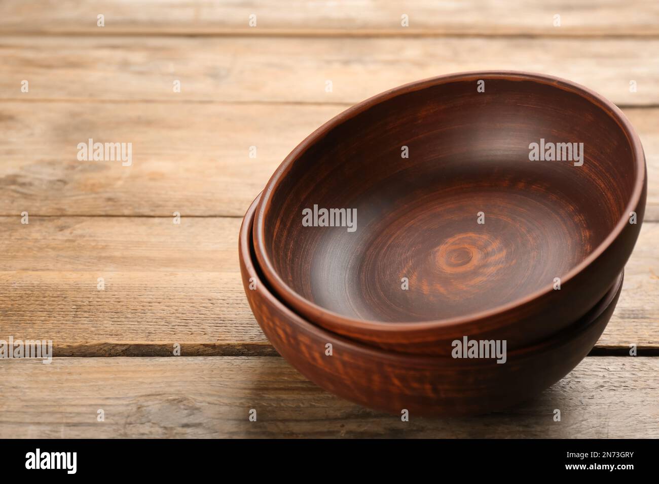 Beautiful empty clay bowls hi-res stock photography and images - Alamy