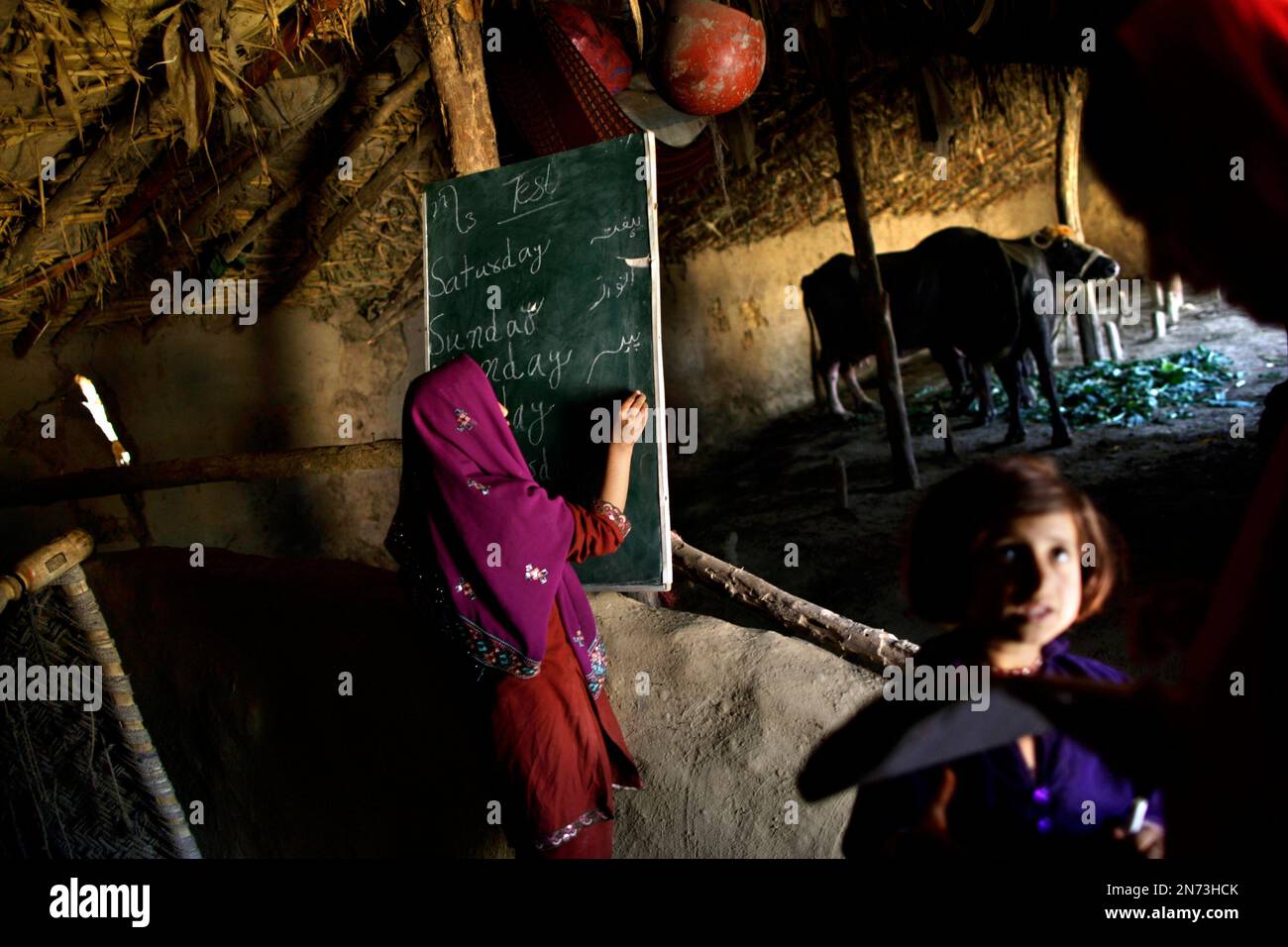 In this Wednesday, March 27, 2013, photo, a Pakistani schoolgirl ...