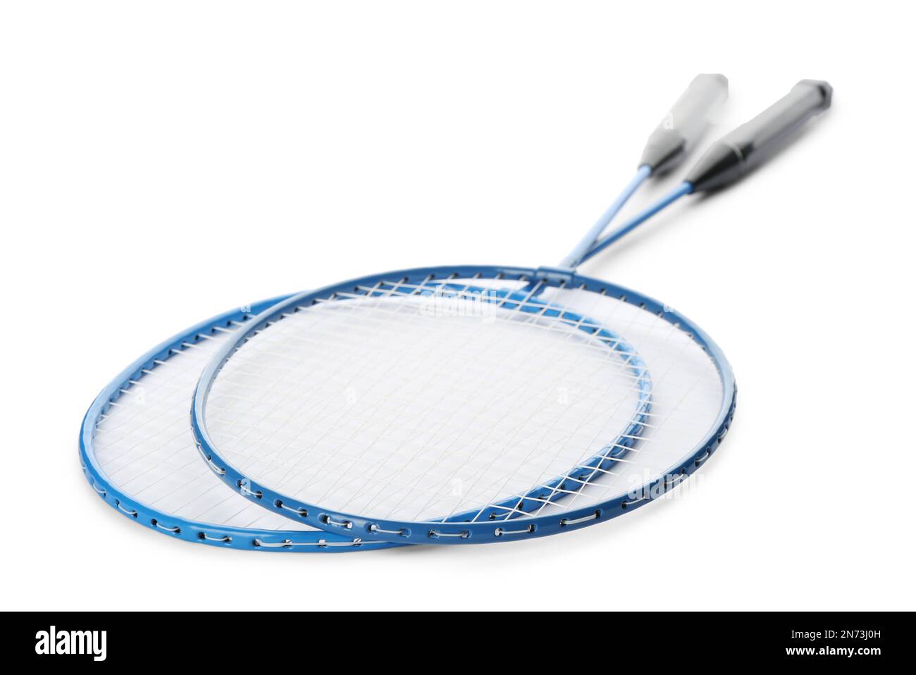 Badminton rackets on white background. Sport equipment Stock Photo - Alamy