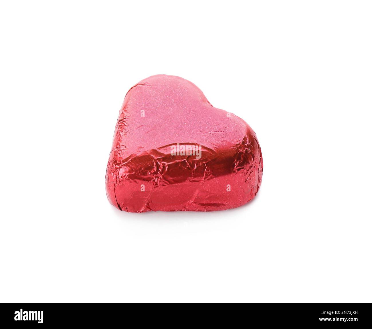 Heart shaped chocolate candy in red foil isolated on white Stock Photo ...