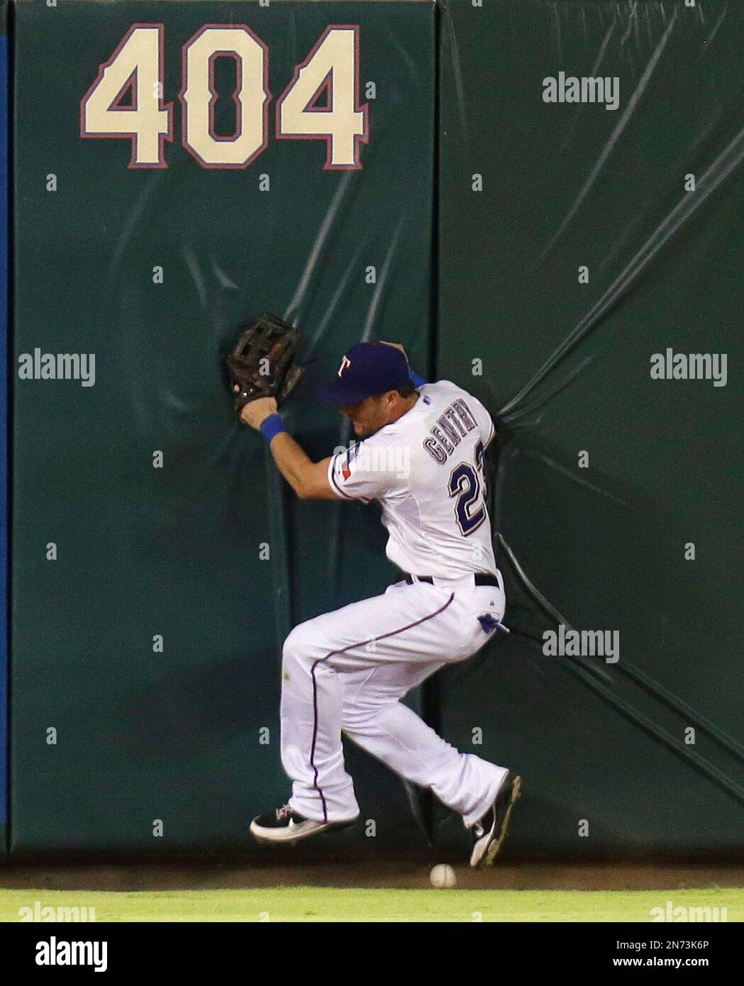 Texas Rangers center fielder Craig Gentry can't catch a triple by New ...