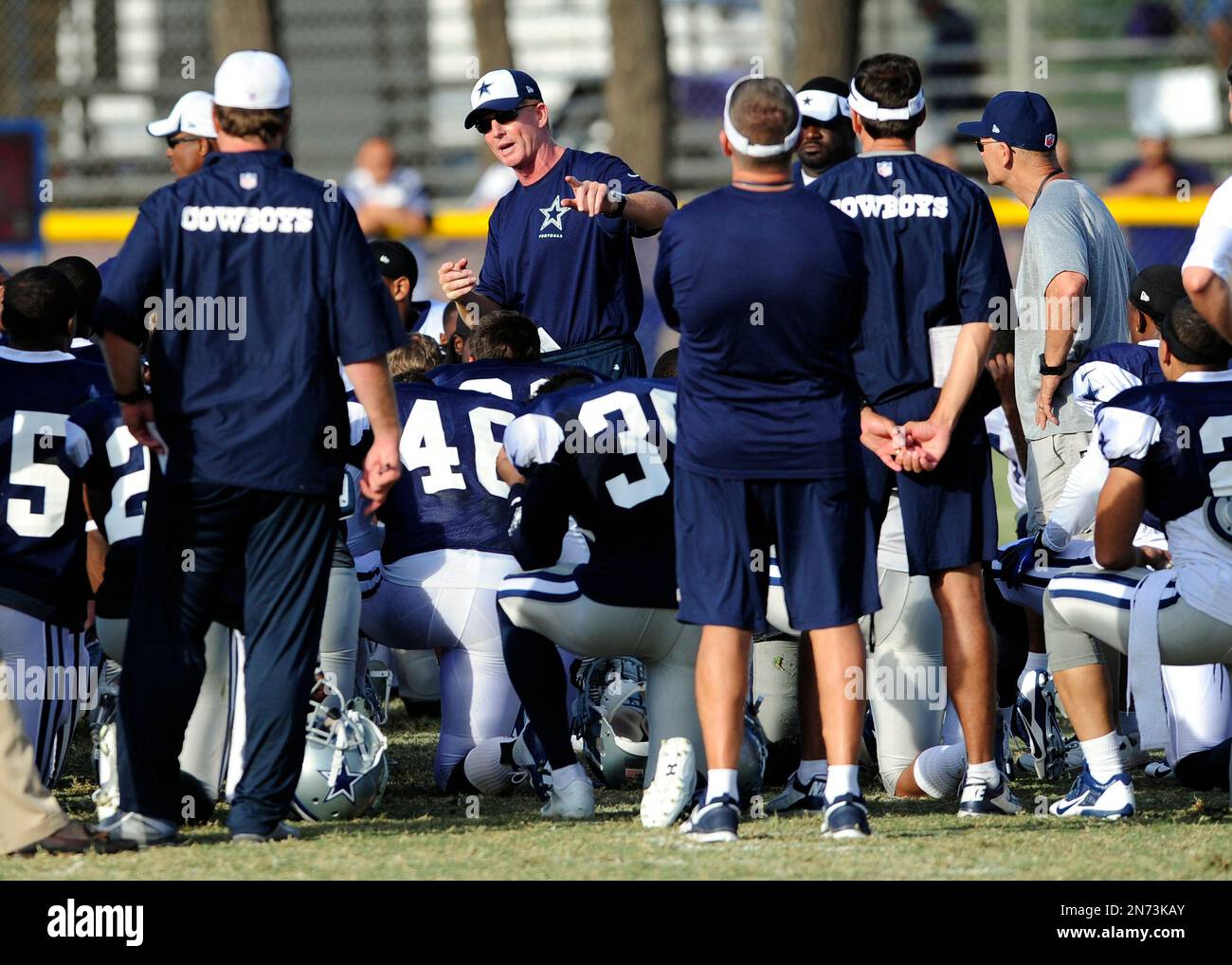 Dallas Cowboys head coach Jason Garrett talks to his team at the end of ...