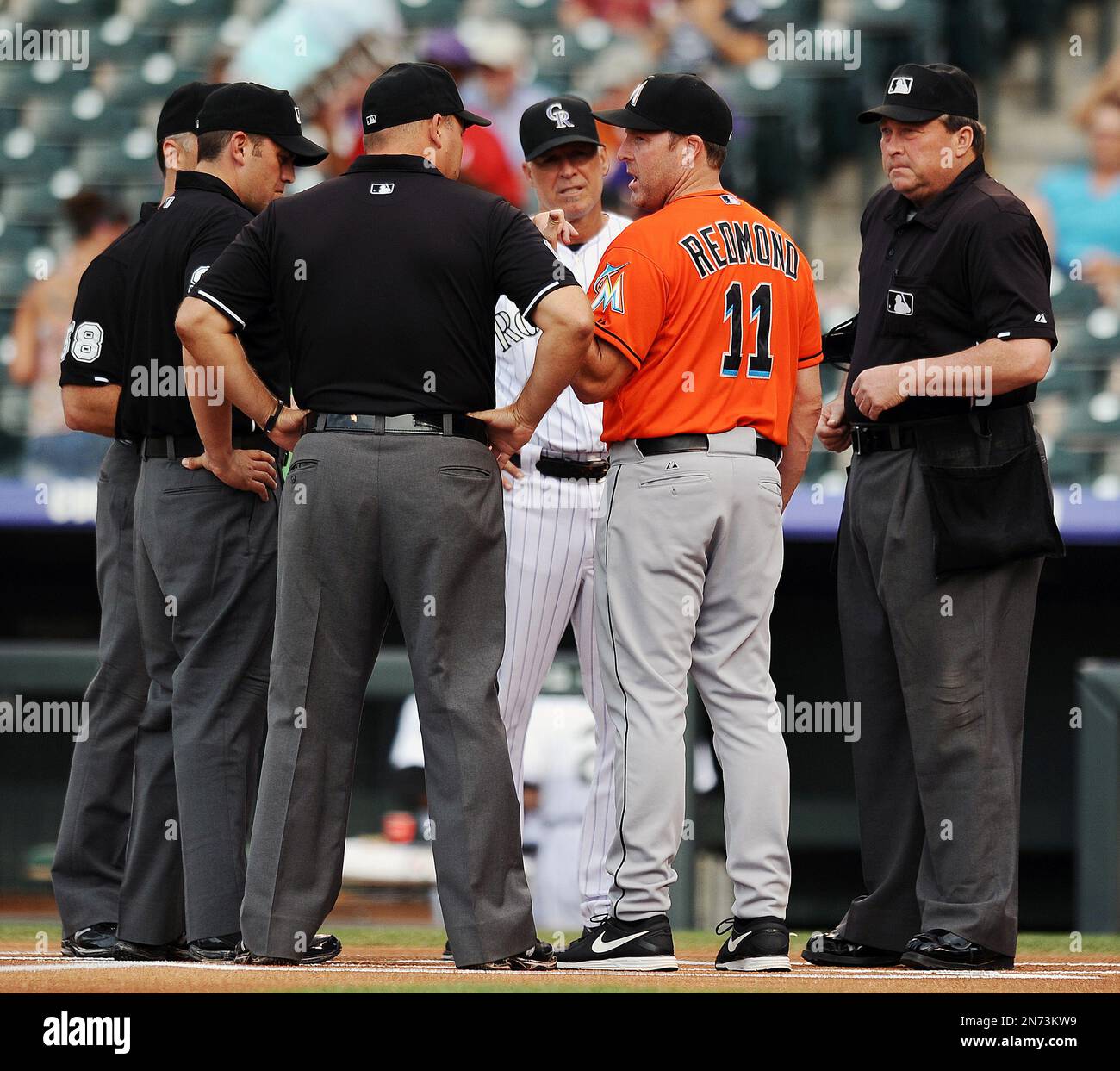 Miami Marlins manager Mike Redmond and Colorado Rockies bench coach Tom ...