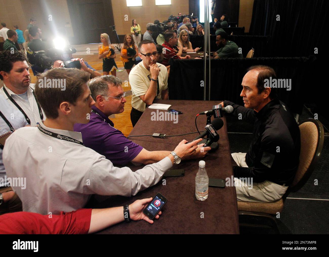 Baylor football coach Art Briles talks to members of the media during a ...