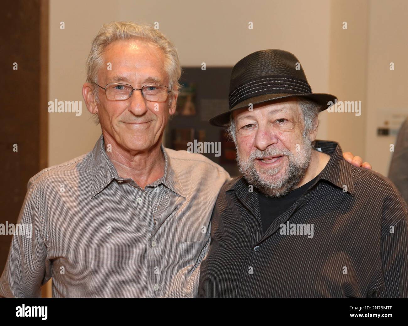 From left, artist Ed Ruscha and actor Ricky Jay pose during the opening ...