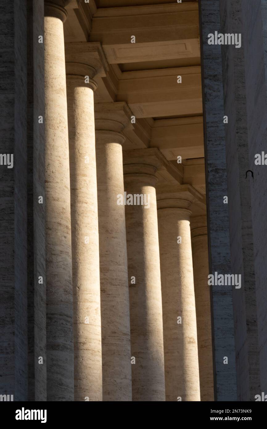 A beautiful vertical view of the columns of an ancient building with ...