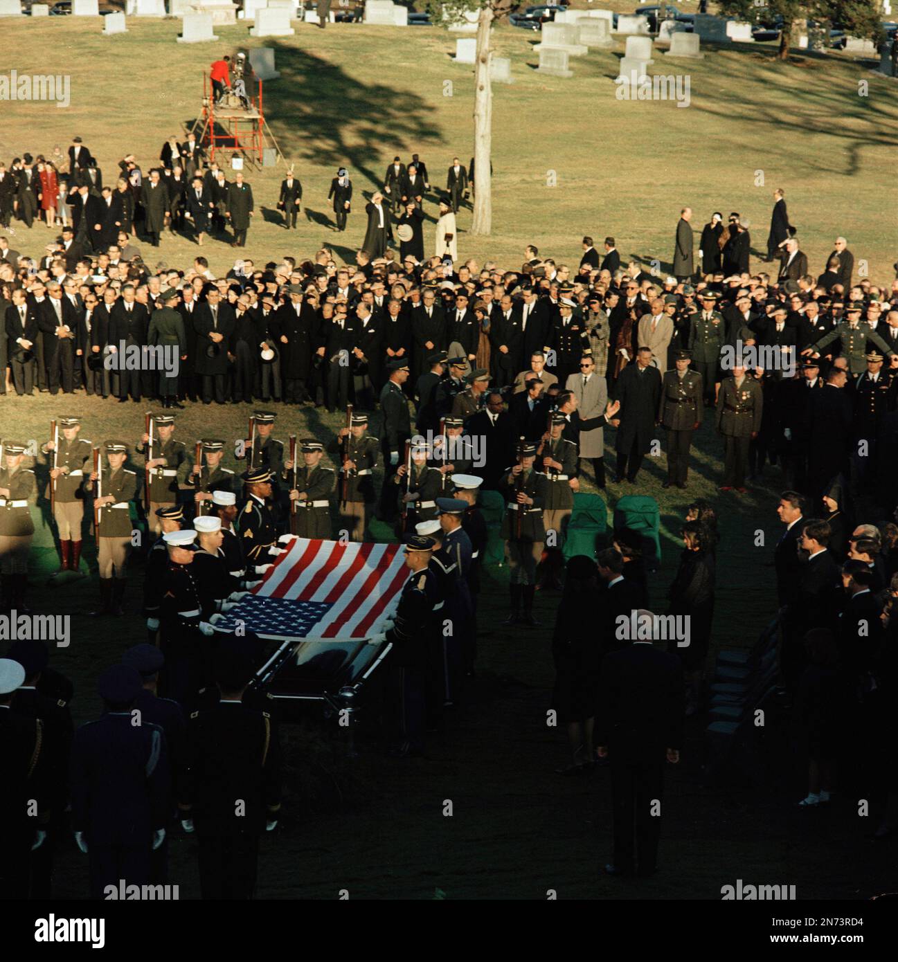 Honor Guards remove the U.S. flag from the coffin of President John F ...
