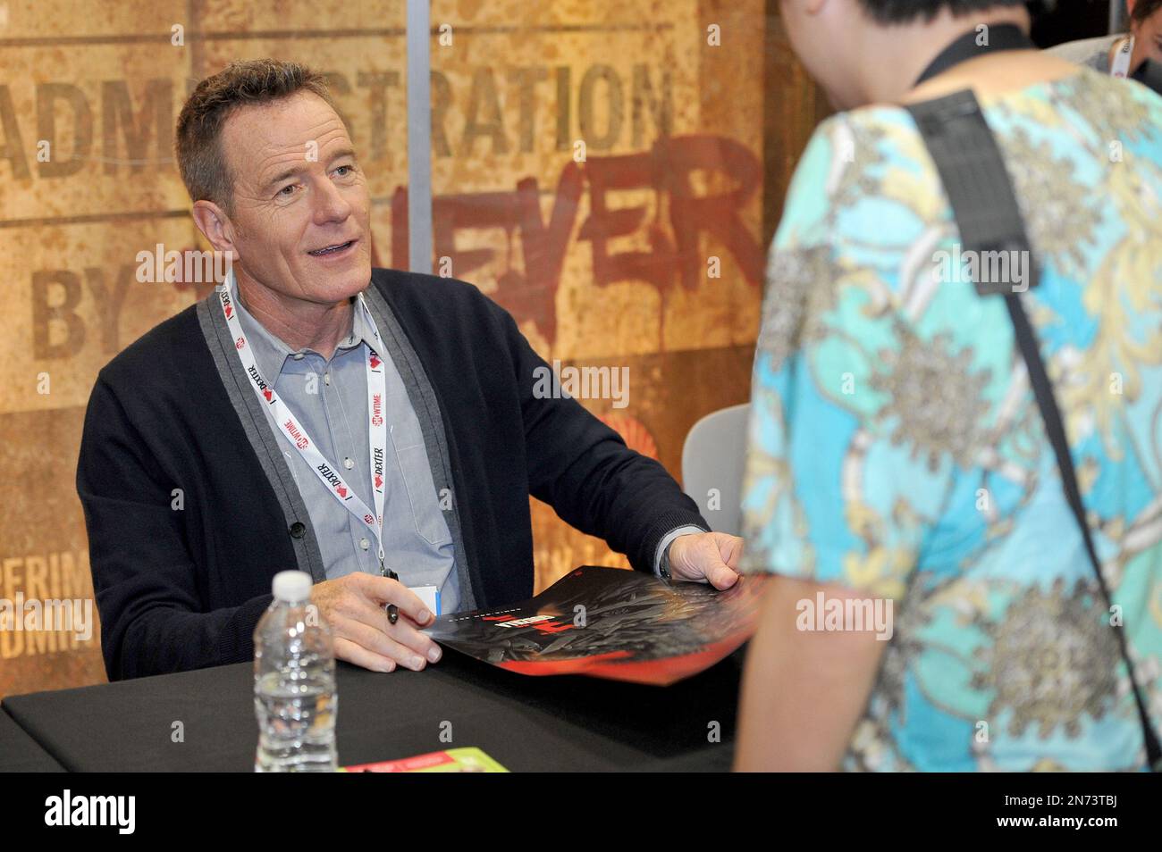 Actor Bryan Cranston of 'Godzilla' signs autographs for fans at the ...