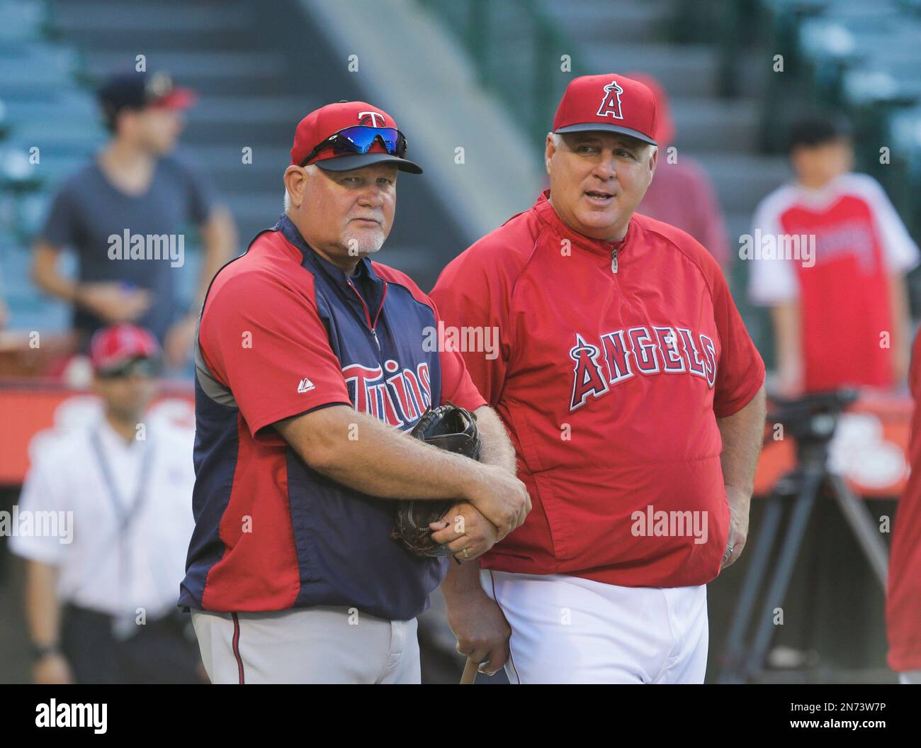 Minnesota Twins manager Ron Gardenhire, left, and Los Angeles Angels ...