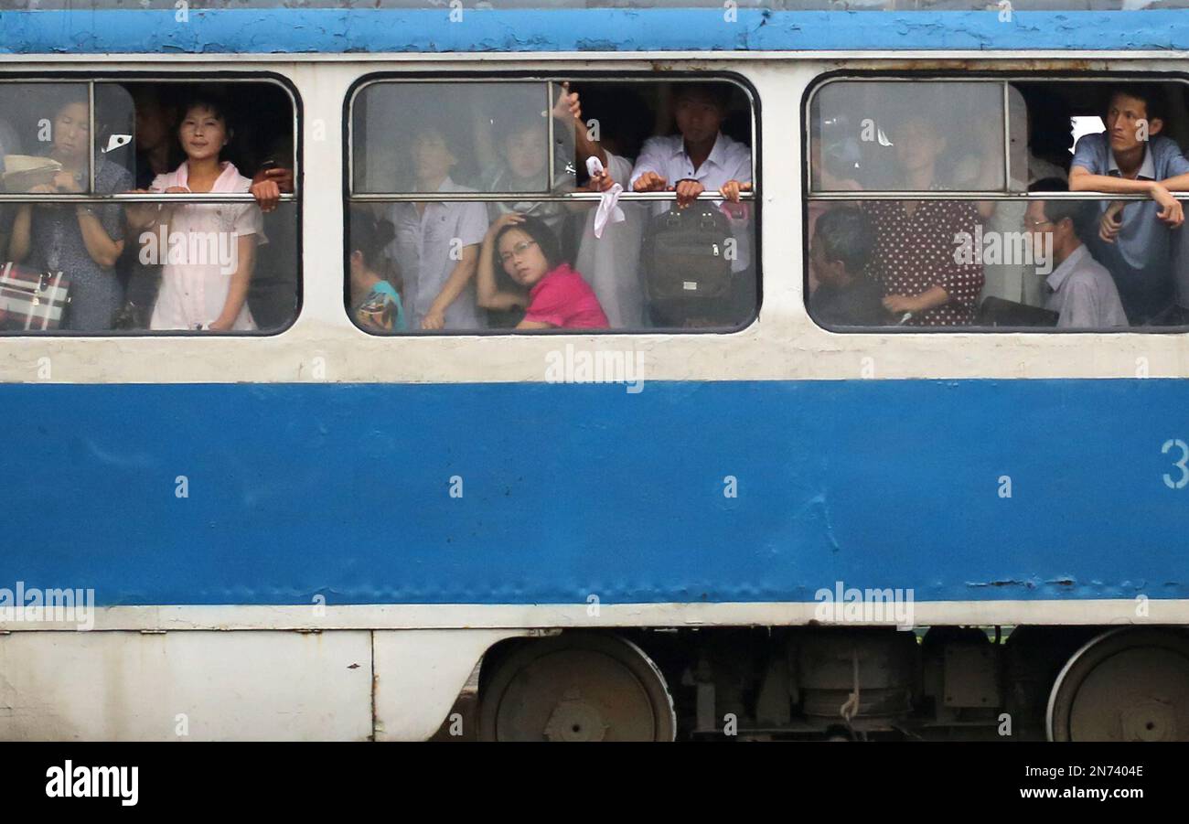 North Korean commuters ride on a tram on Monday, July 22, 2013 in ...
