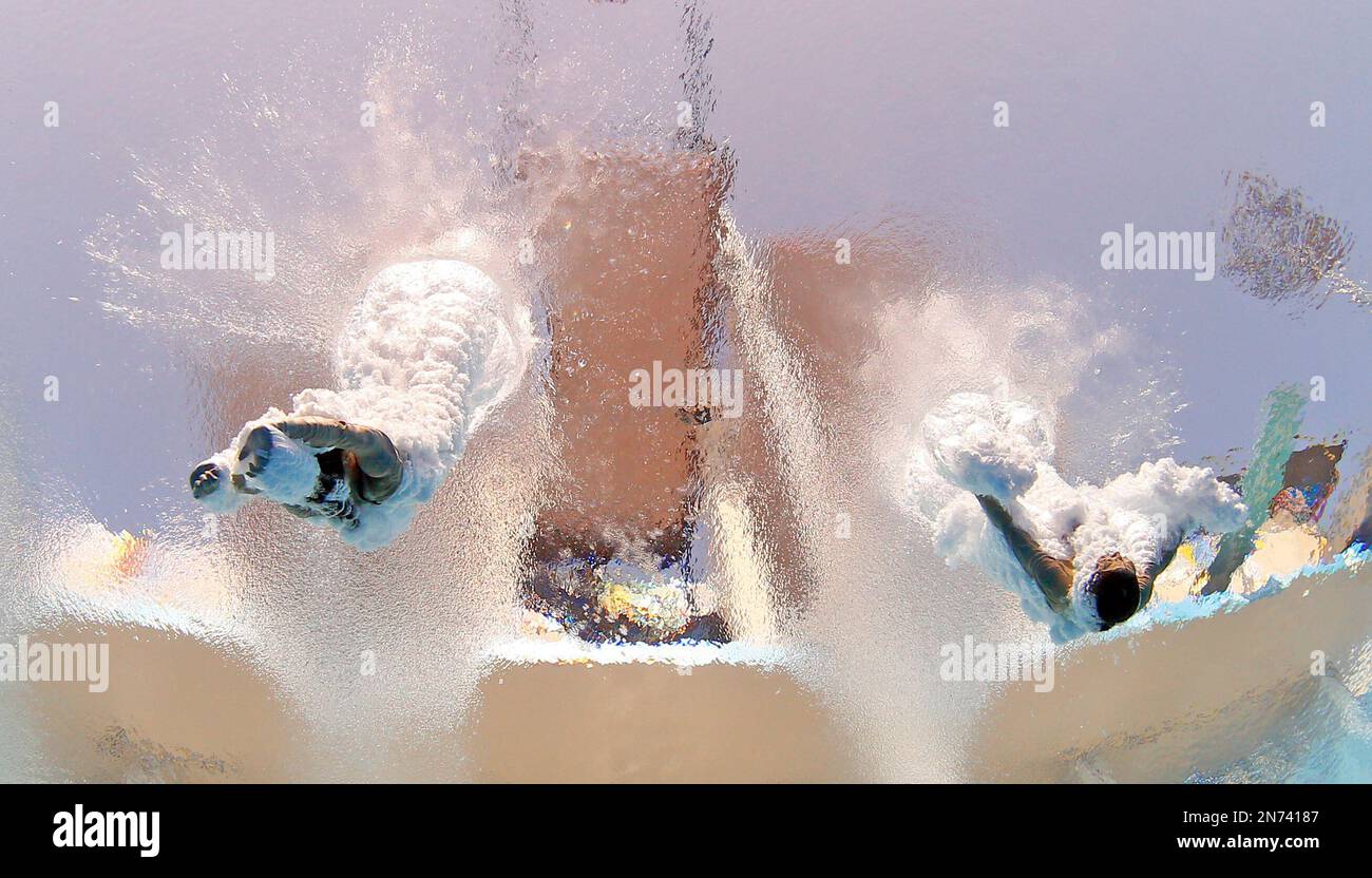 Eunbi Cho and Suji Kim of South Korea, compete in the women's 10-meter ...