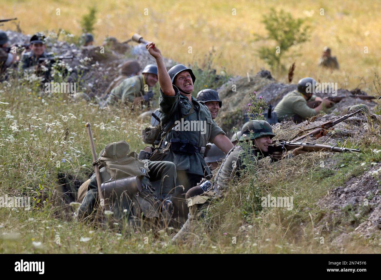 Ukrainians dressed in the SS Galychyna Division uniform act during ...